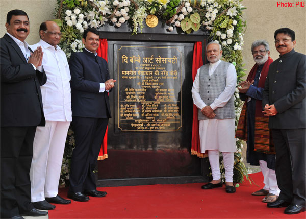 PM Modi unveiling the plaque to mark the inauguration